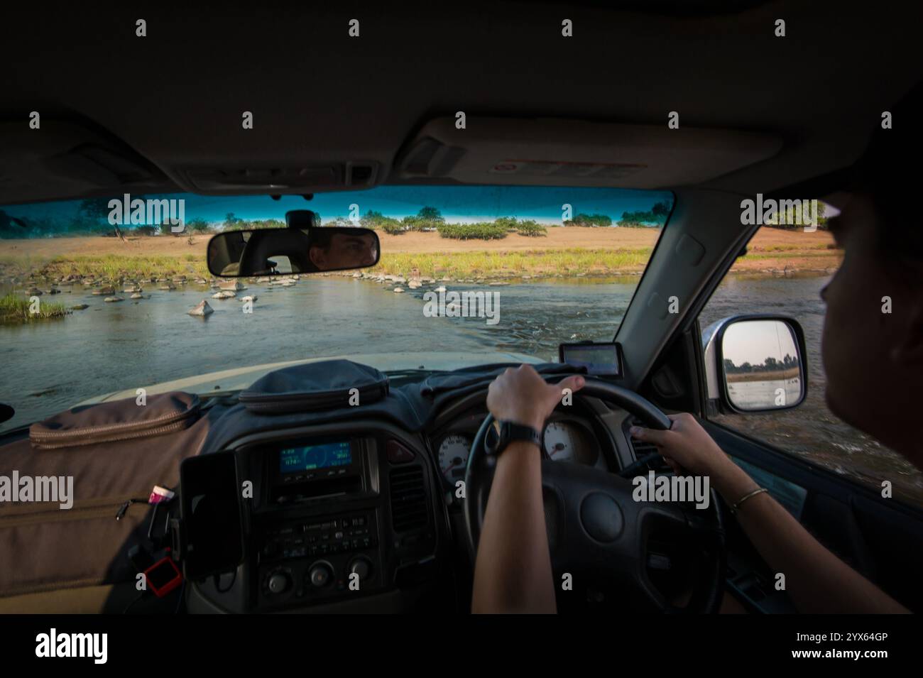 Driving acorss the Runde River at Fishan's Crossing on a self-drive ...