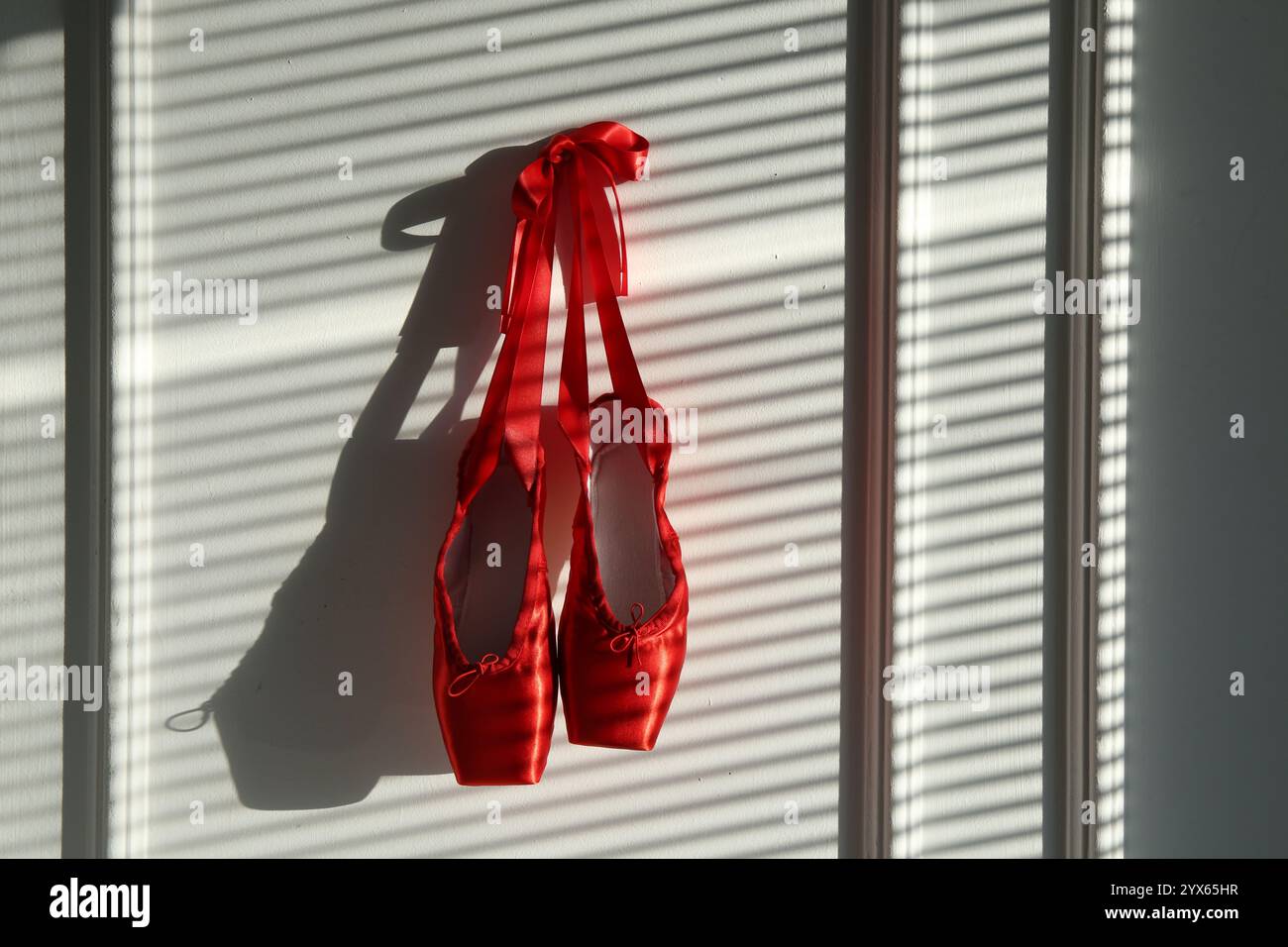 Pointe ballet shoes hanging on hi-res stock photography and images - Alamy