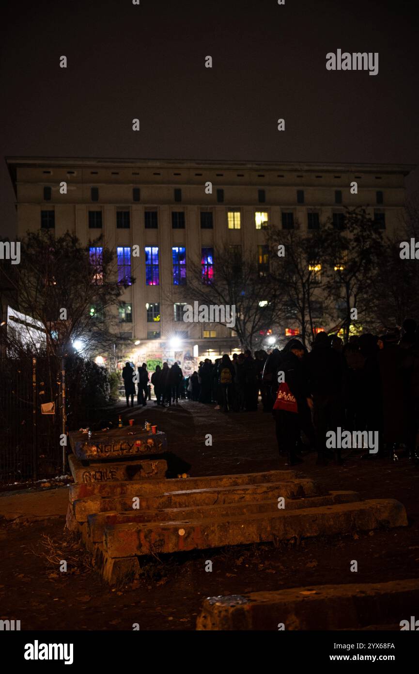 Berlin, Germany. 13th Dec, 2024. People queue in front of the Berghain ...