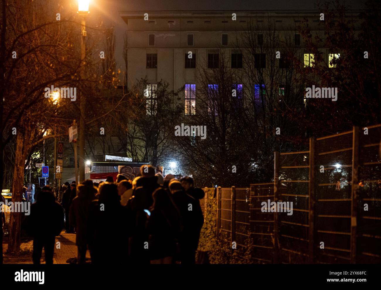 Berlin, Germany. 13th Dec, 2024. People queue in front of the Berghain ...