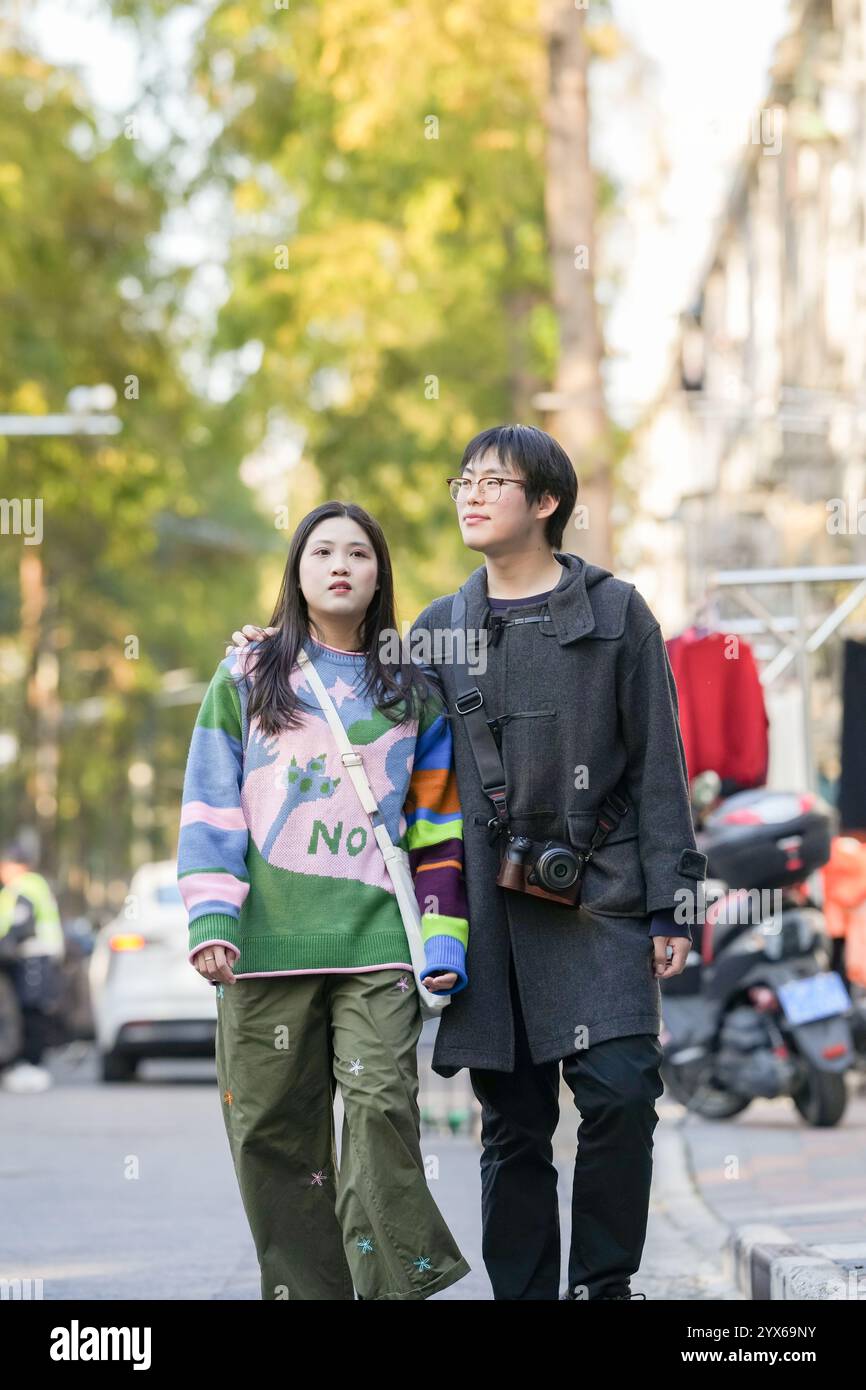 Young asian couple walks hi-res stock photography and images - Alamy