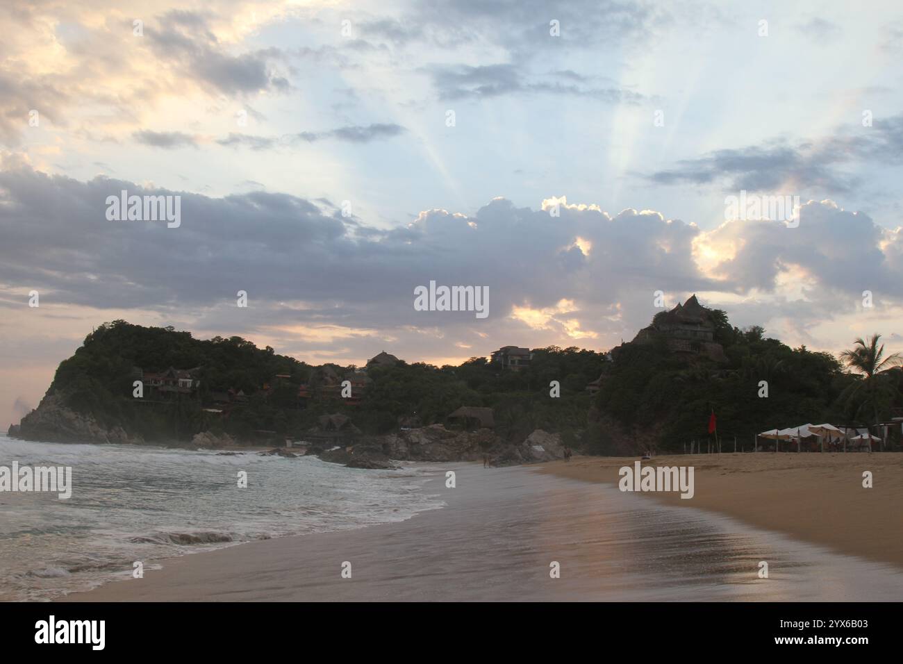 Sunset at the beach at the touristic city of Huatulco in Oaxaca, Mexico ...