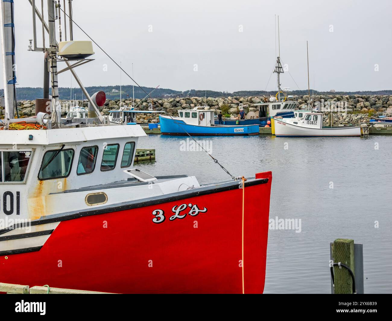 Fishing boats in Murphys Pond Harbour on the Cabot Trail on Cape Breton ...
