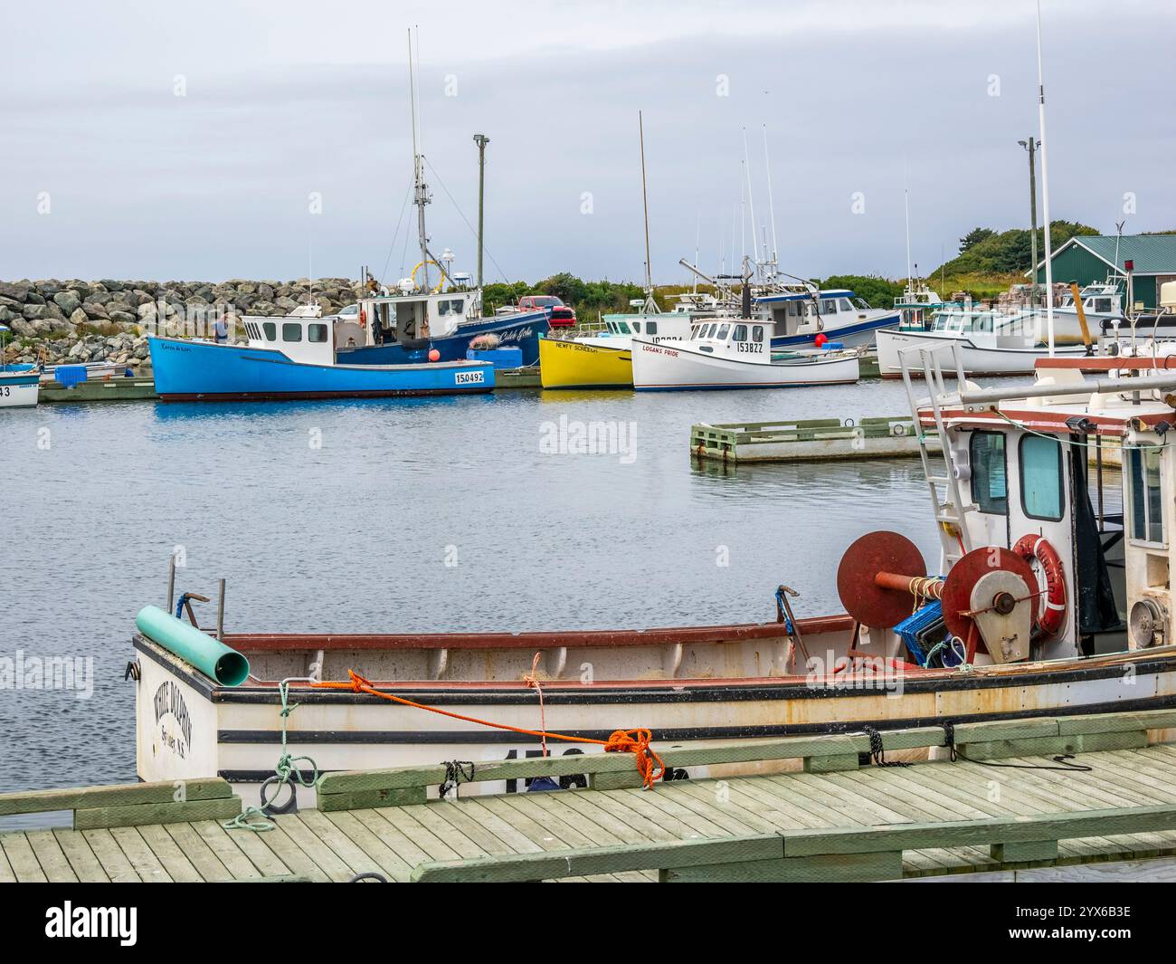 Fishing boats in Murphys Pond Harbour on the Cabot Trail on Cape Breton ...