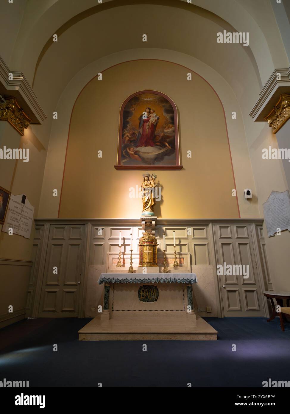 Statue of the Virgin Mary holding Baby Jesus in a chapel in the ...