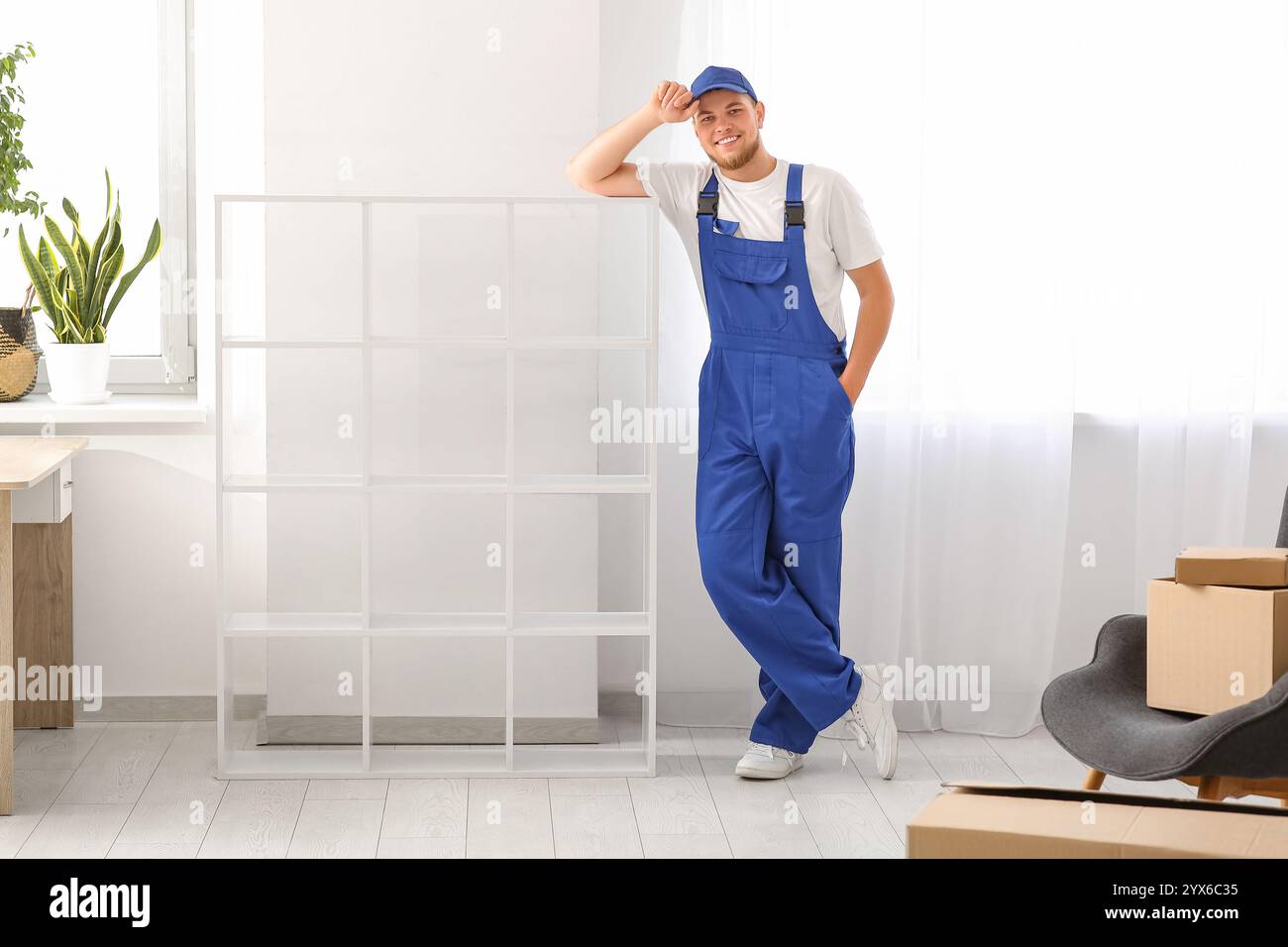 Loader with shelving unit at home on moving day Stock Photo - Alamy