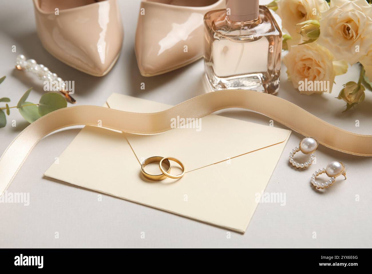 Wedding rings on envelope letter hi-res stock photography and images ...