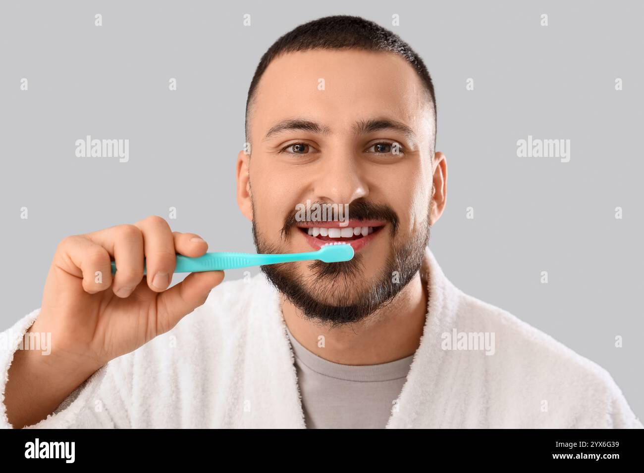 Bearded man brushing teeth in hi-res stock photography and images - Alamy