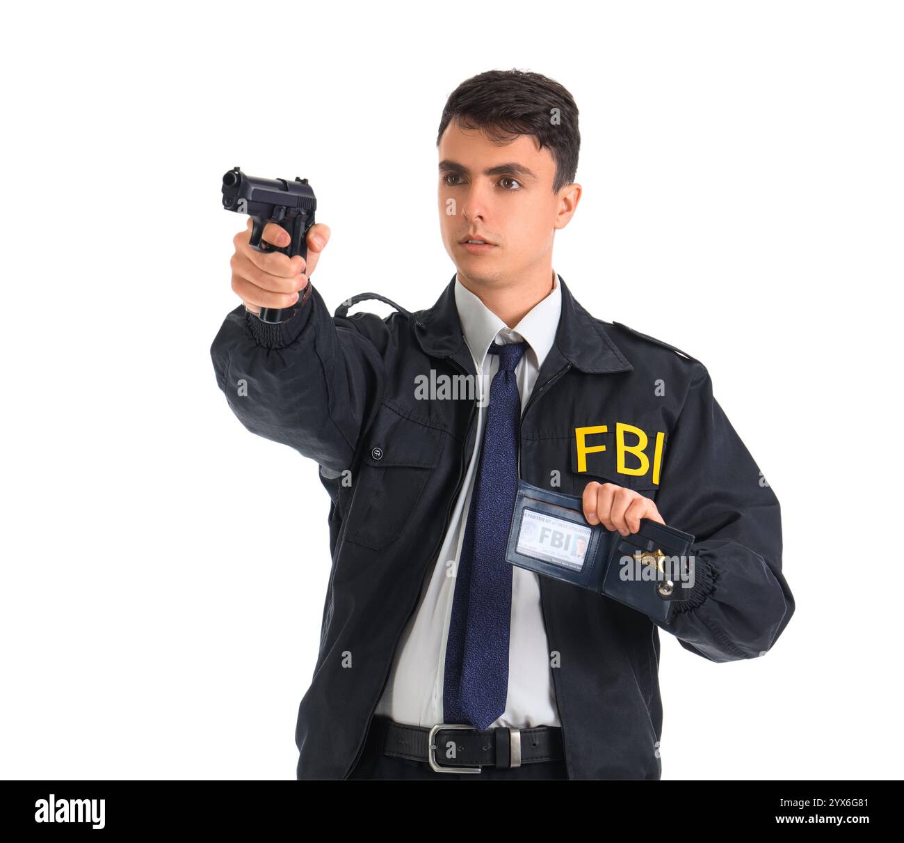Male FBI agent with gun and document on white background Stock Photo ...