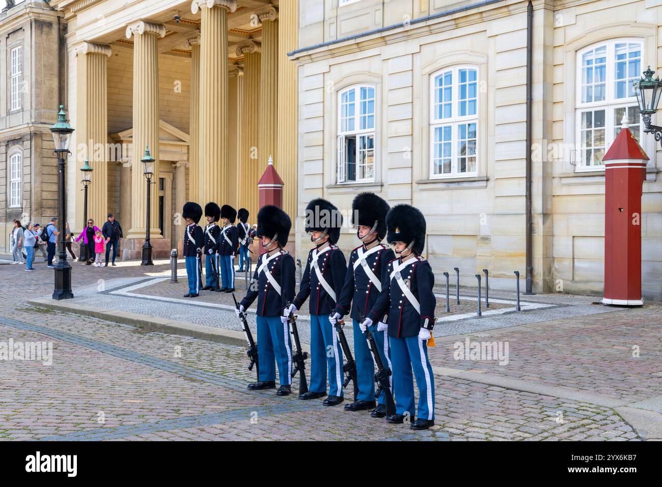 Male and female members of the Danish Royal Guard on duty at ...