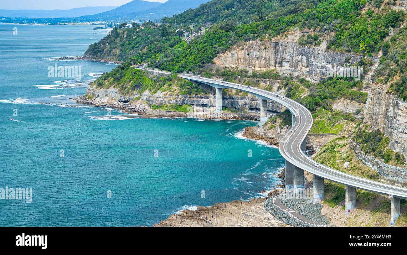 Iconic Sea Cliff Bridge stretching along the rocky Australian coast in ...
