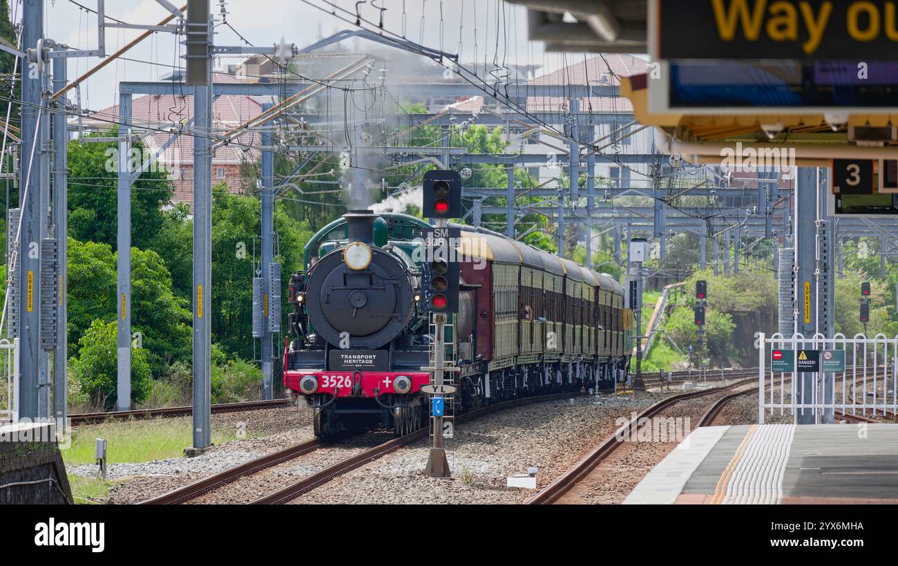 Arncliffe, Sydney, NSW - 5 October 2024: Heritage Class 35 steam locomotive passing through ...