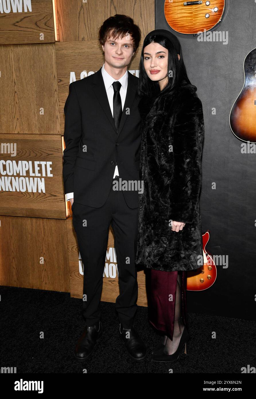 Charlie Tahan, left, and guest attend the premiere of "A Complete ...