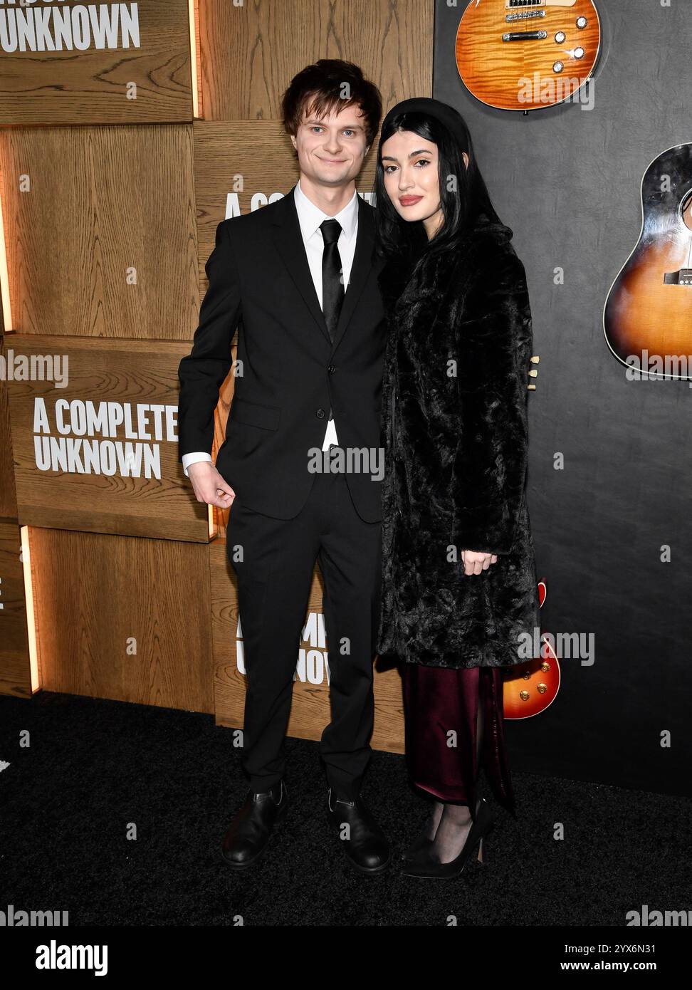 Charlie Tahan, left, and guest attend the premiere of "A Complete ...