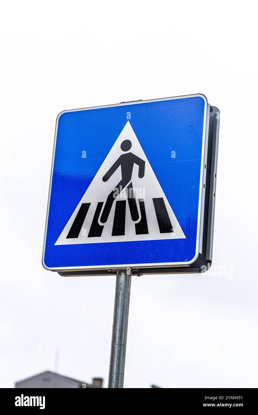 Blue traffic sign pedestrian crossing Stock Photo - Alamy
