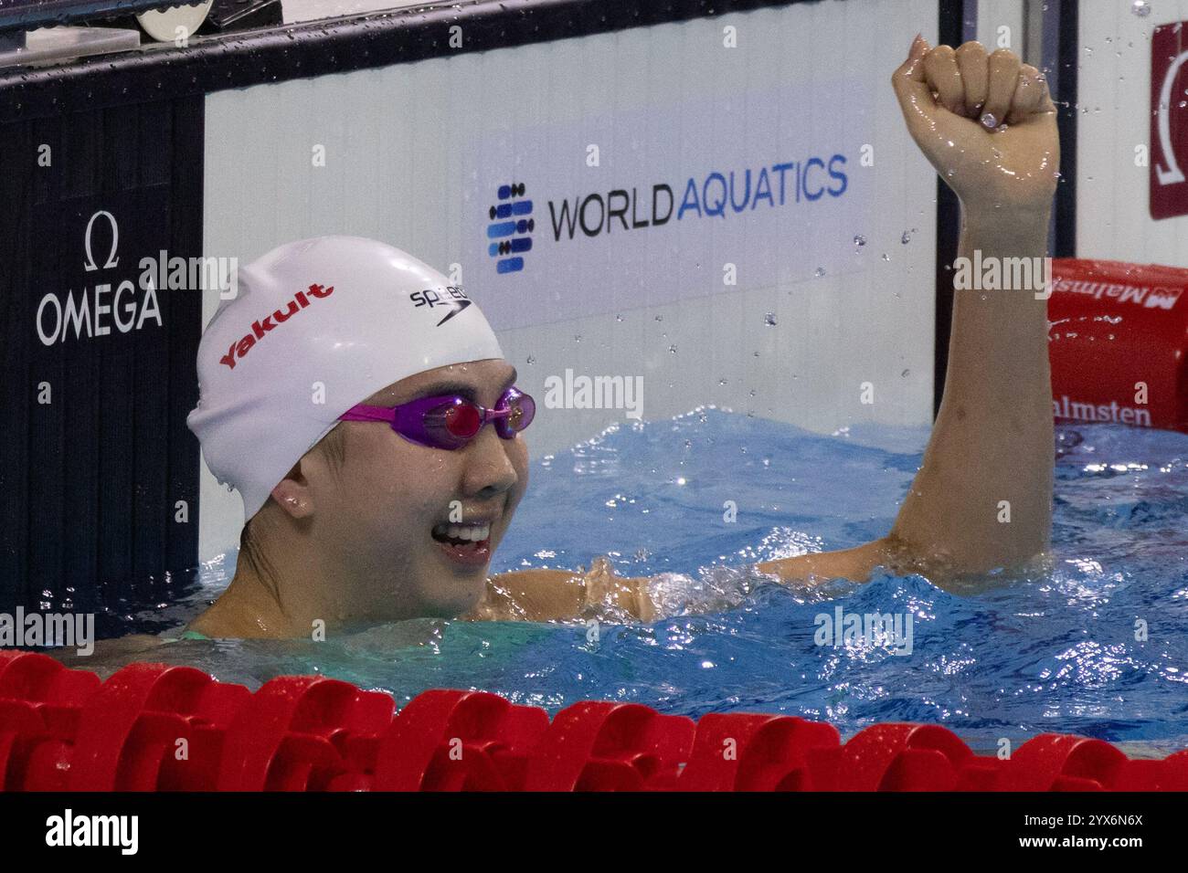 Beijing, Hungary. 12th Dec, 2024. Tang Qianting of China reacts after ...