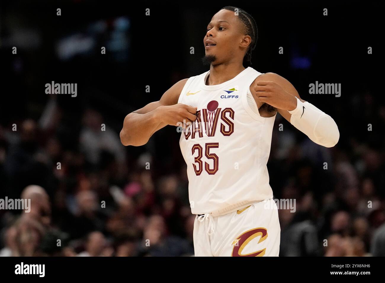 Cleveland Cavaliers forward Isaac Okoro (35) celebrates after hitting a ...
