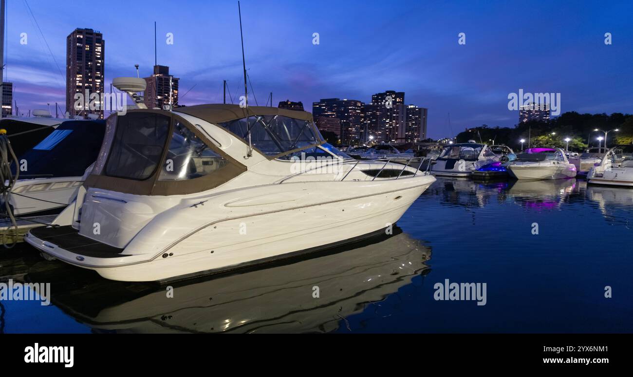 Yacht club. Marina in night. Summer vacation. Downtown city marina with ...