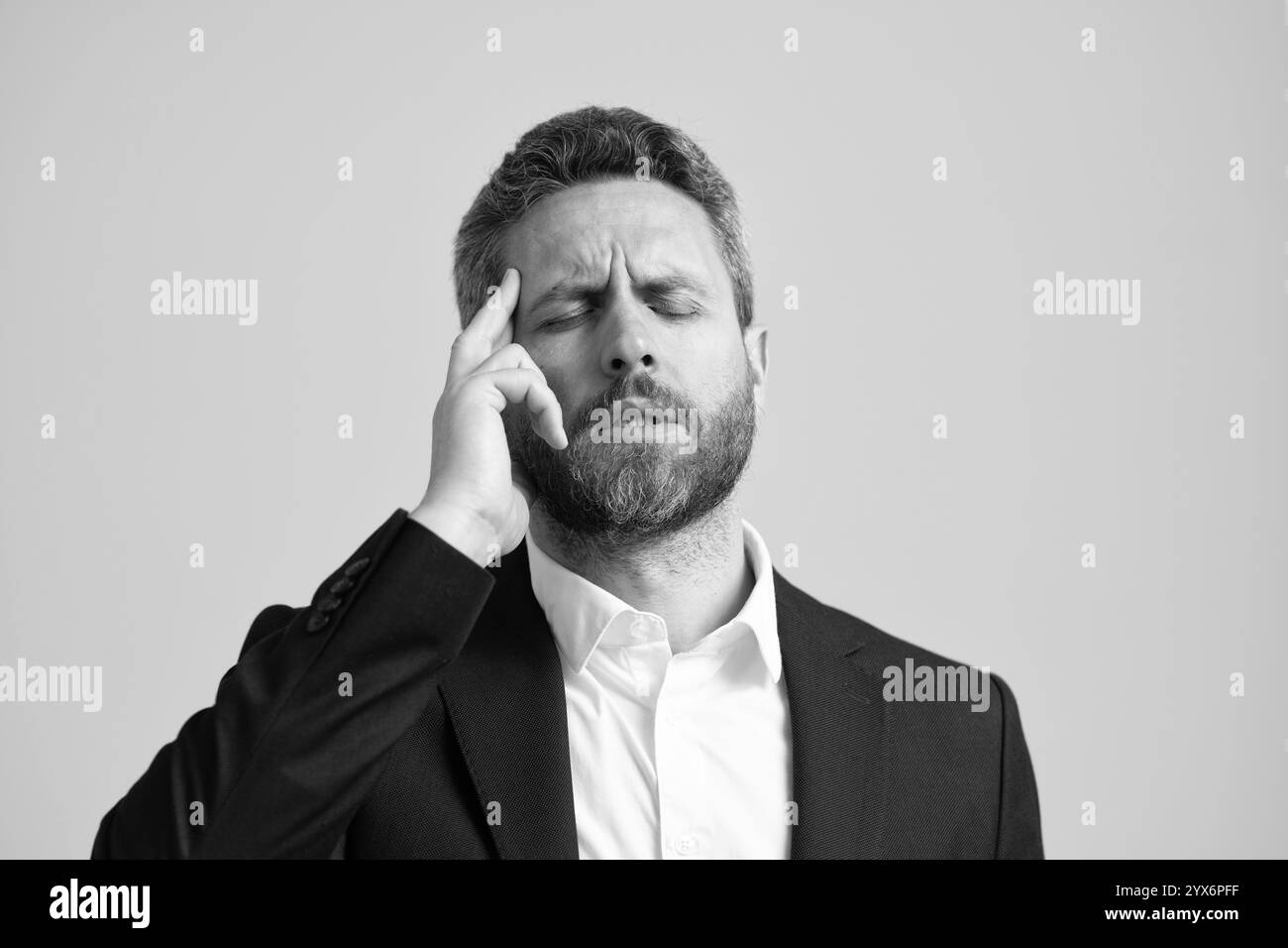 Businessman with stress and burnout. Business man got migraine touch ...