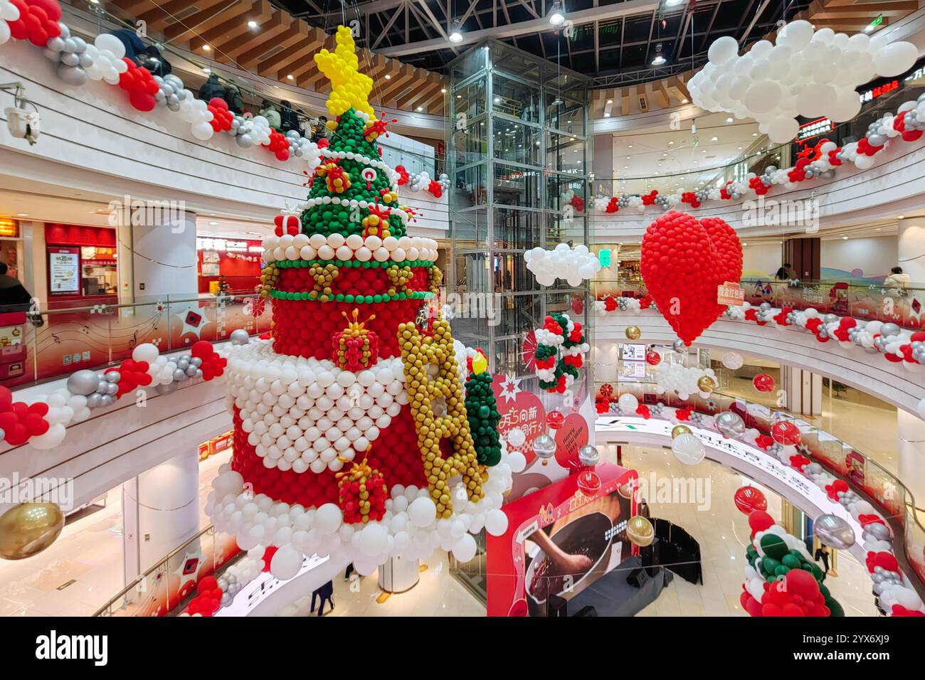XI'AN, CHINA - DECEMBER 13, 2024 - A 10-meter-high "Christmas tree" is ...