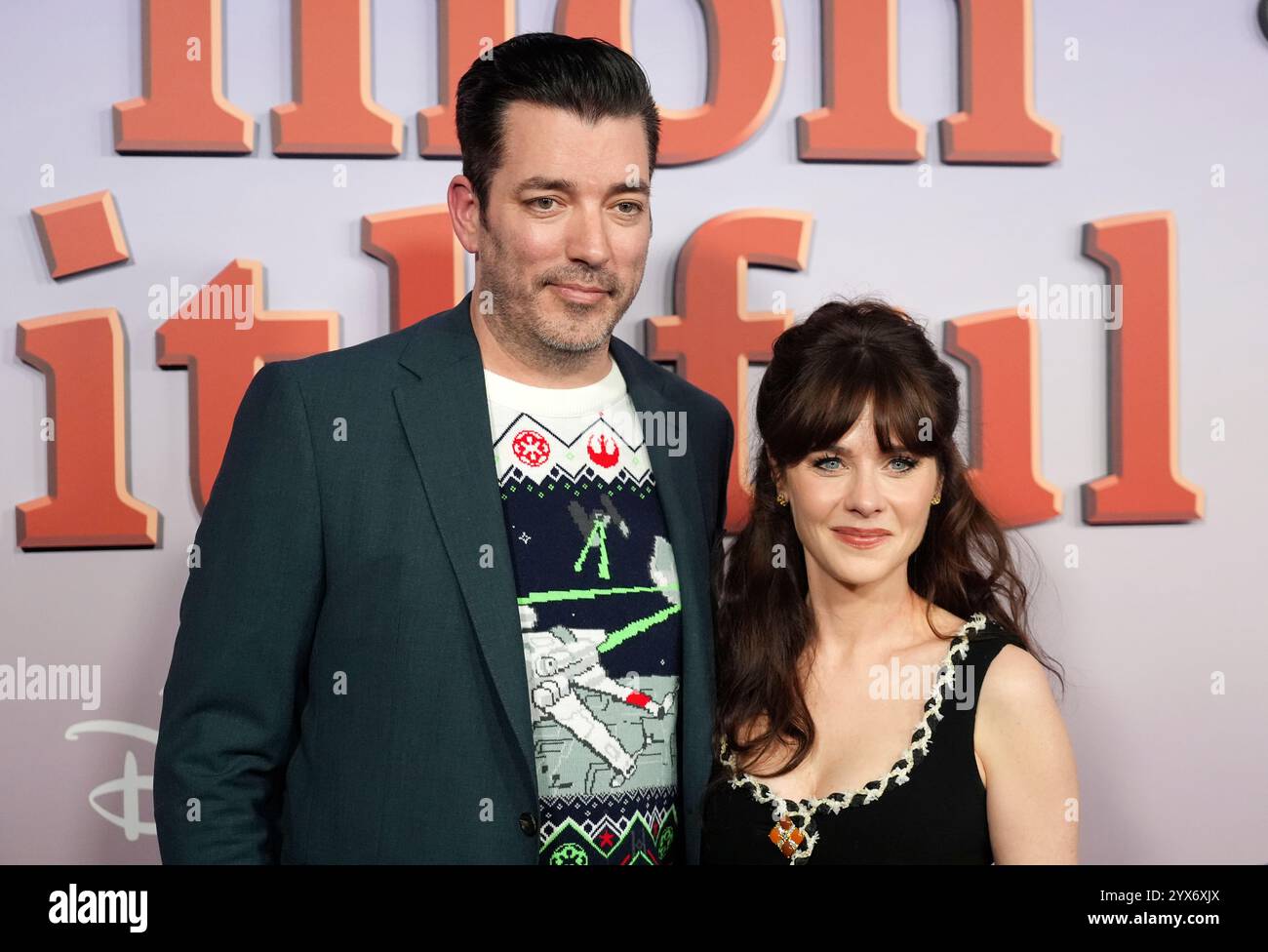 Voice cast member Zooey Deschanel, right, and Jonathan Scott pose ...