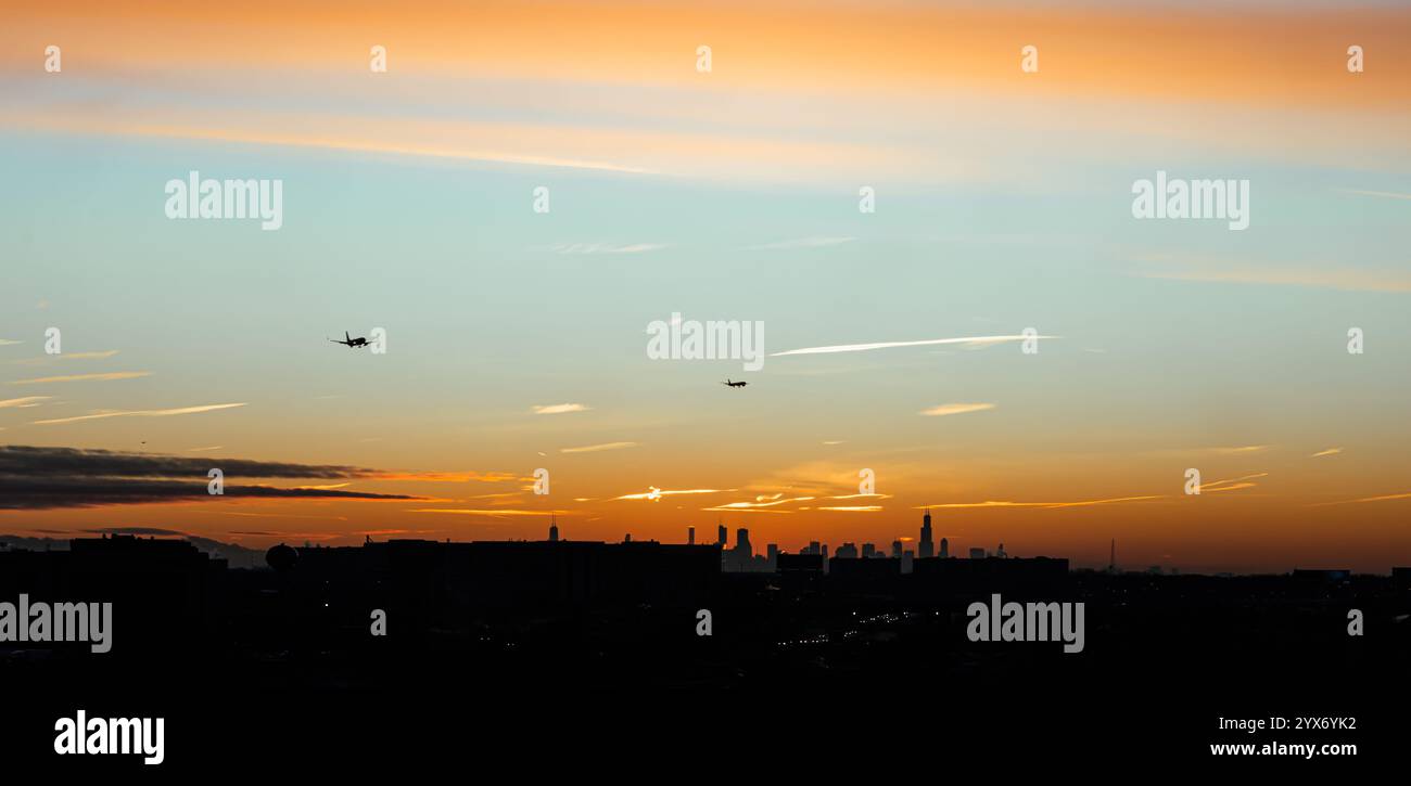 sunrise in chicago with cloud covered sky and airplanes ready to land ... sunrise in chicago with cloud covered sky and airplanes ready to land ...