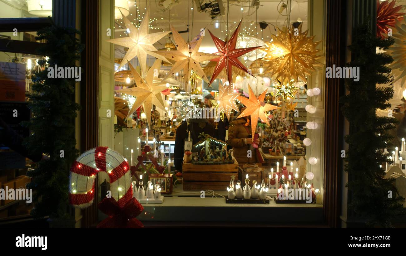 Stockholm, Sweden, December 7, 2024. A shop window decorated with stars ...