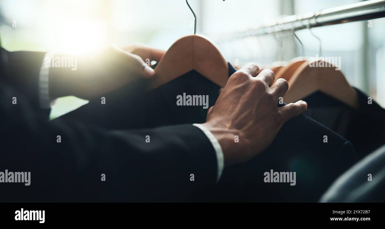 Hands, businessman and choose for clothes shopping with blazer check ...