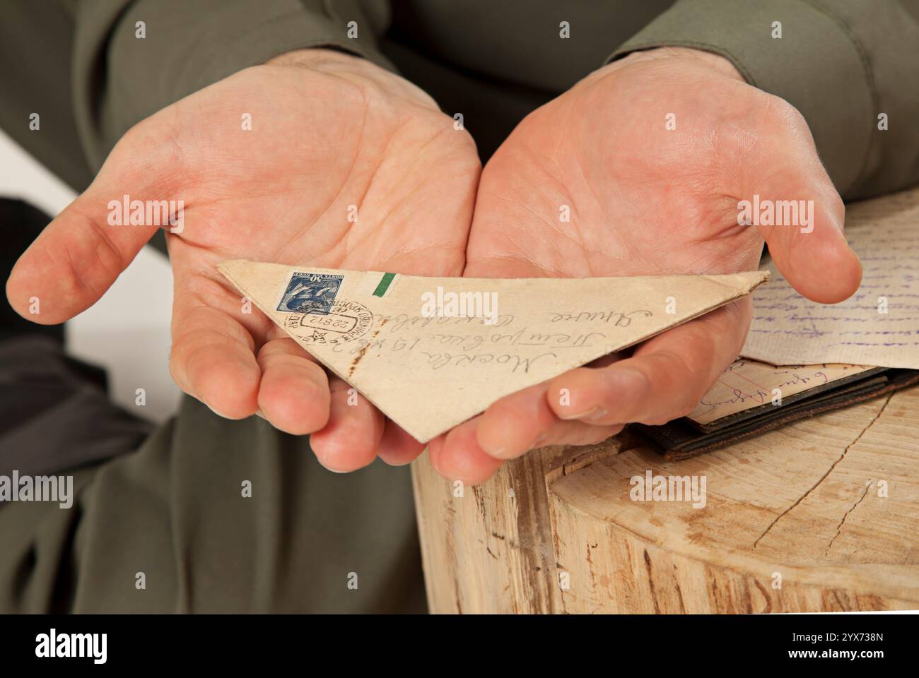 Soldier hands holding a letter from the Second World War close-up Stock ...