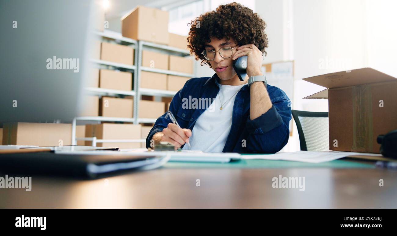 Computer, phone call and writing with man in logistics company office ...