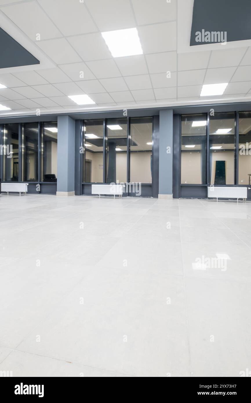 panorama view in empty modern hall with columns, doors and panoramic ...