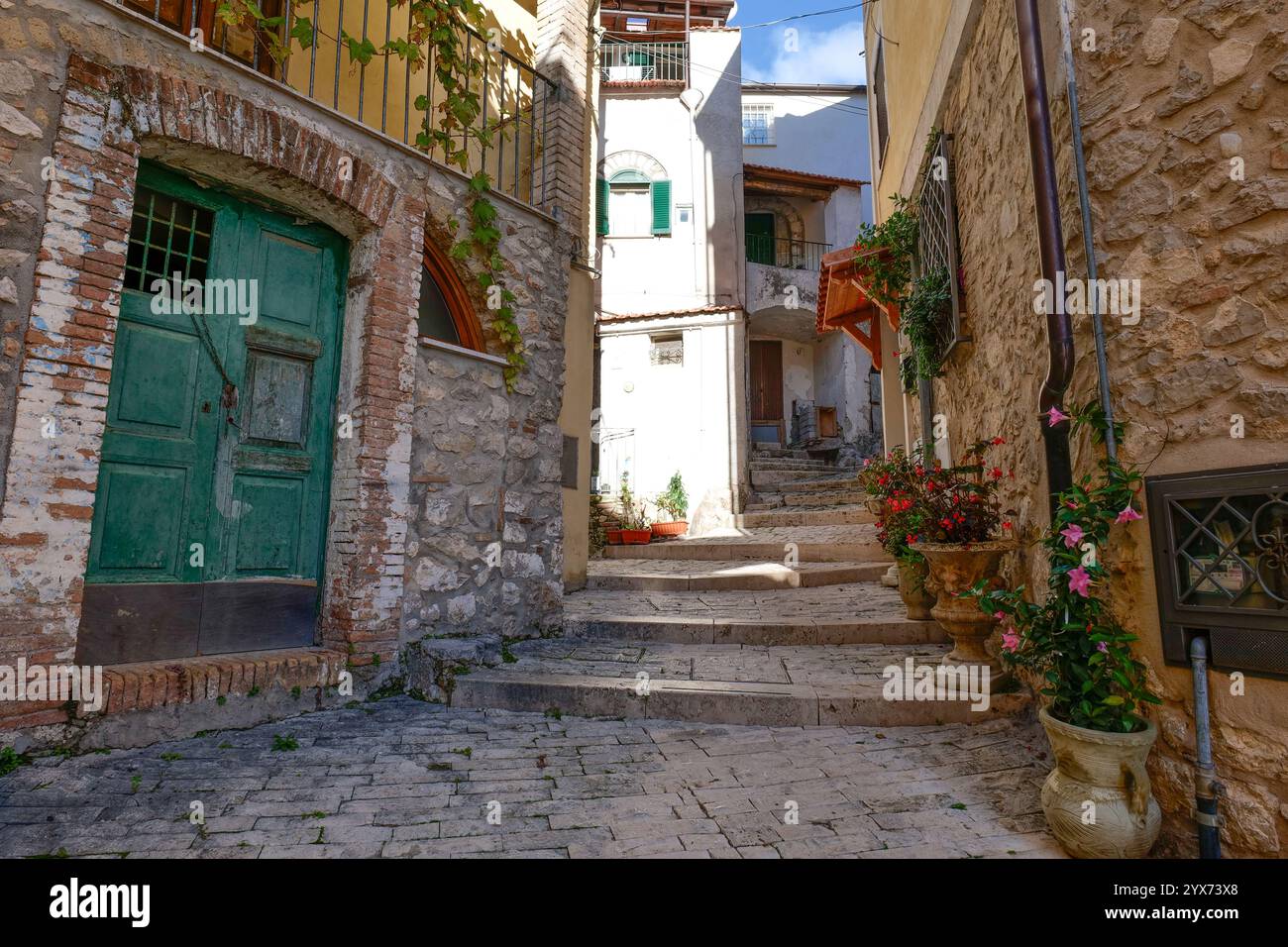 An alley among the stone houses of Maranola, a small medieval town in ...