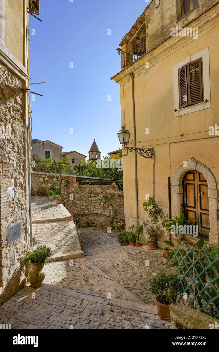 An alley among the stone houses of Maranola, a small medieval town in ...