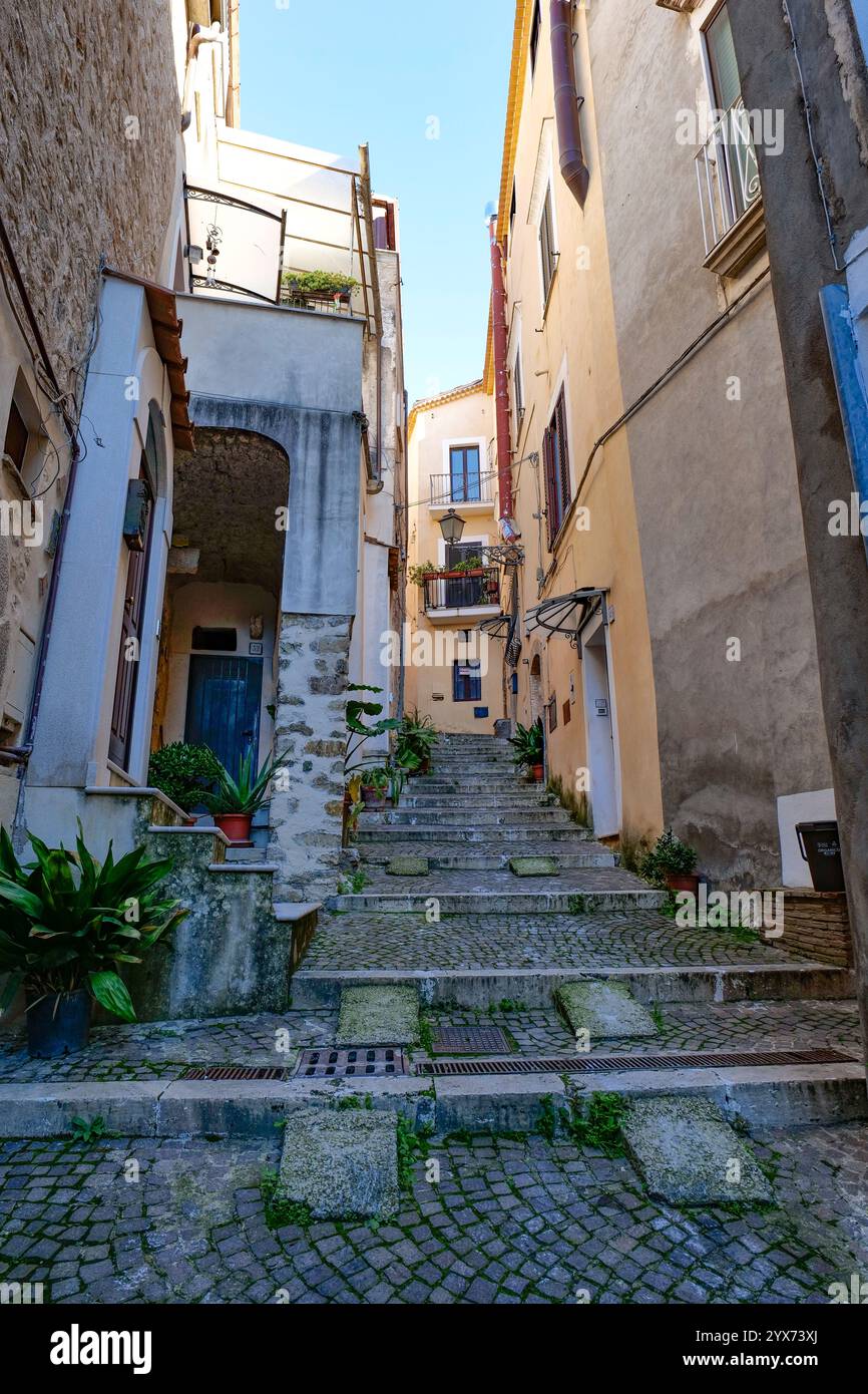 An alley among the stone houses of Maranola, a small medieval town in ...