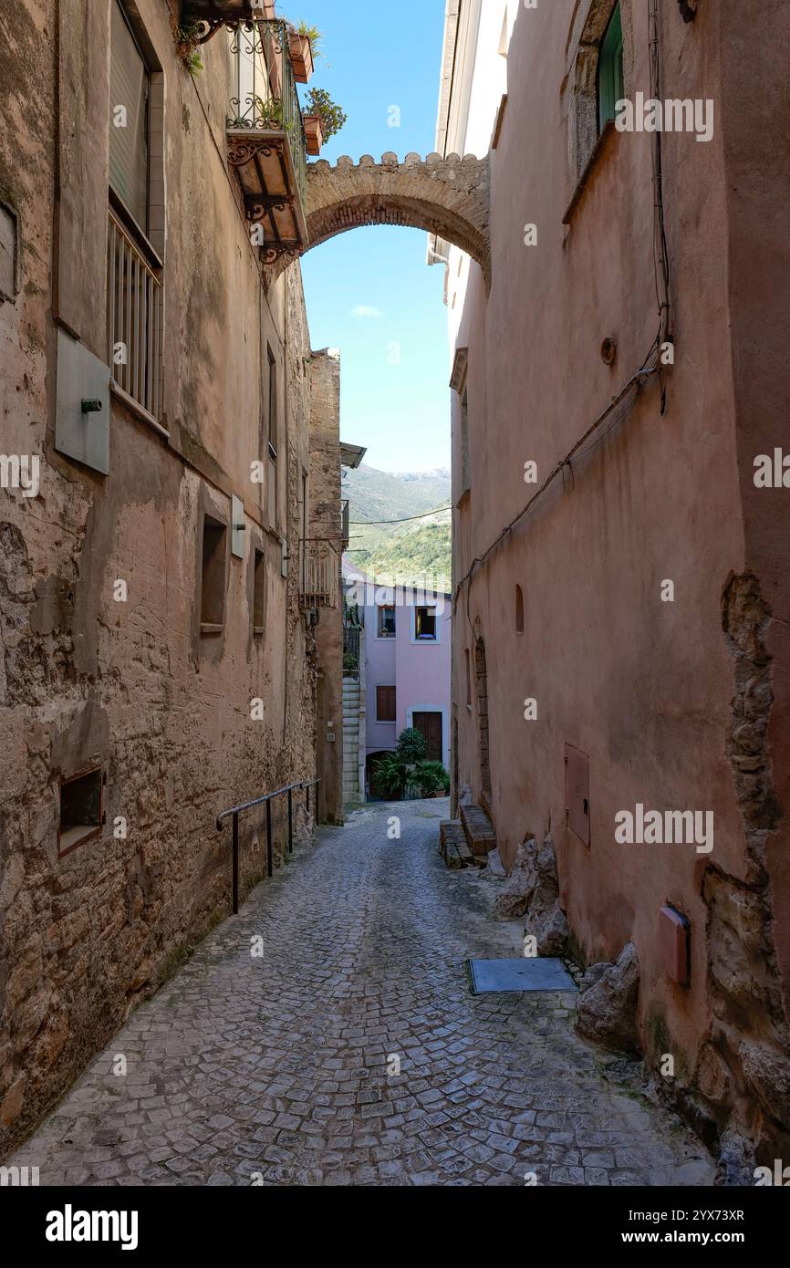 An alley among the stone houses of Maranola, a small medieval town in ...