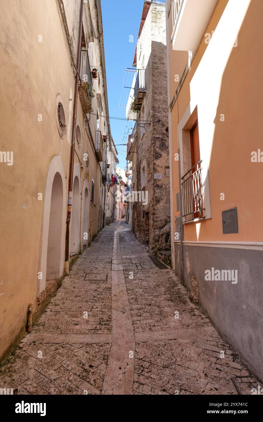 An alley among the stone houses of Maranola, a small medieval town in ...
