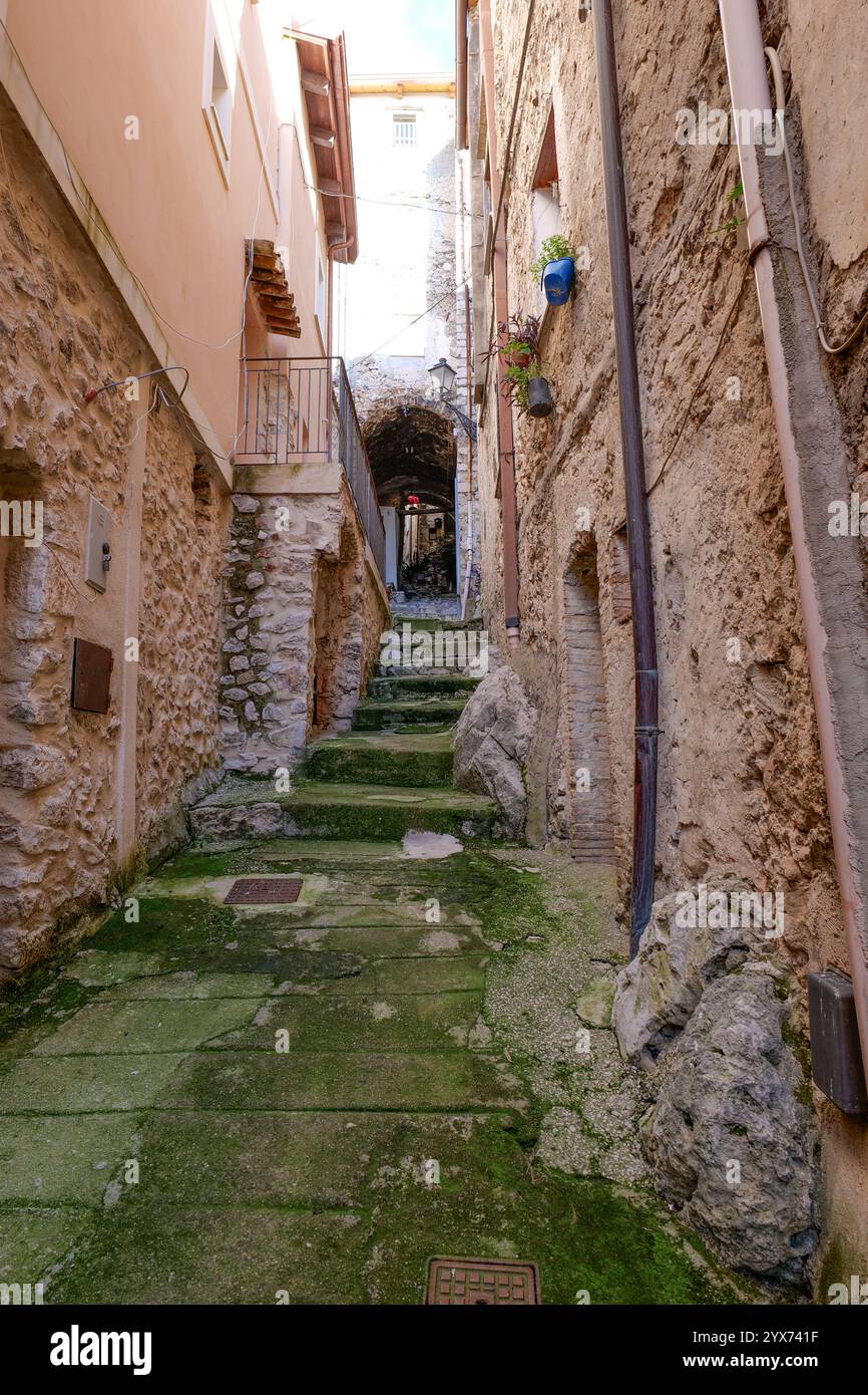 An alley among the stone houses of Maranola, a small medieval town in ...