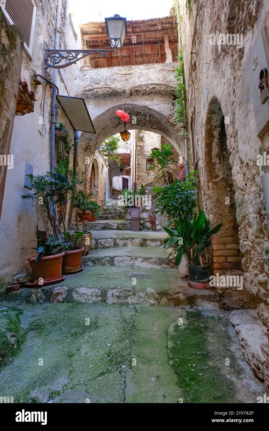An alley among the stone houses of Maranola, a small medieval town in ...