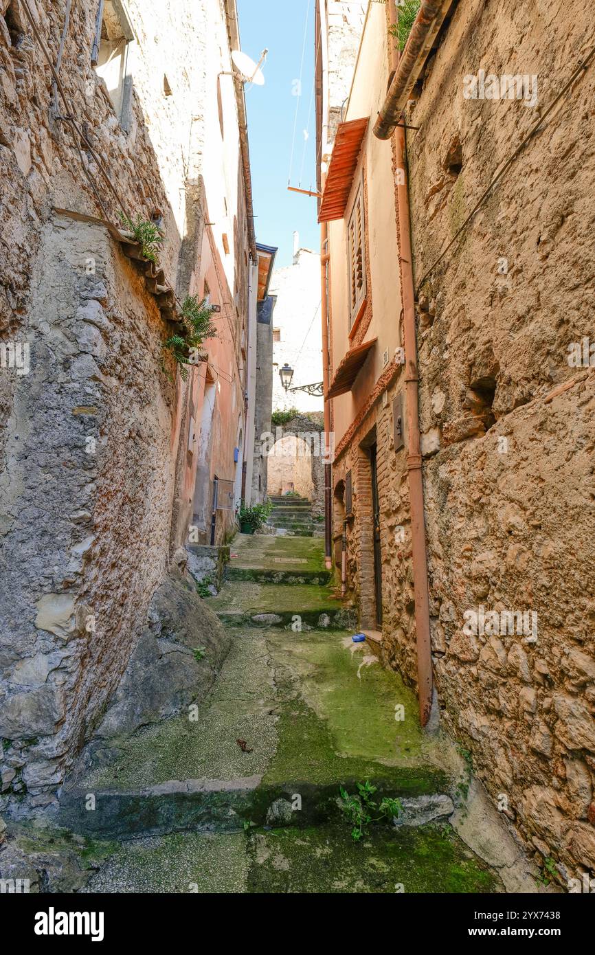 An alley among the stone houses of Maranola, a small medieval town in ...