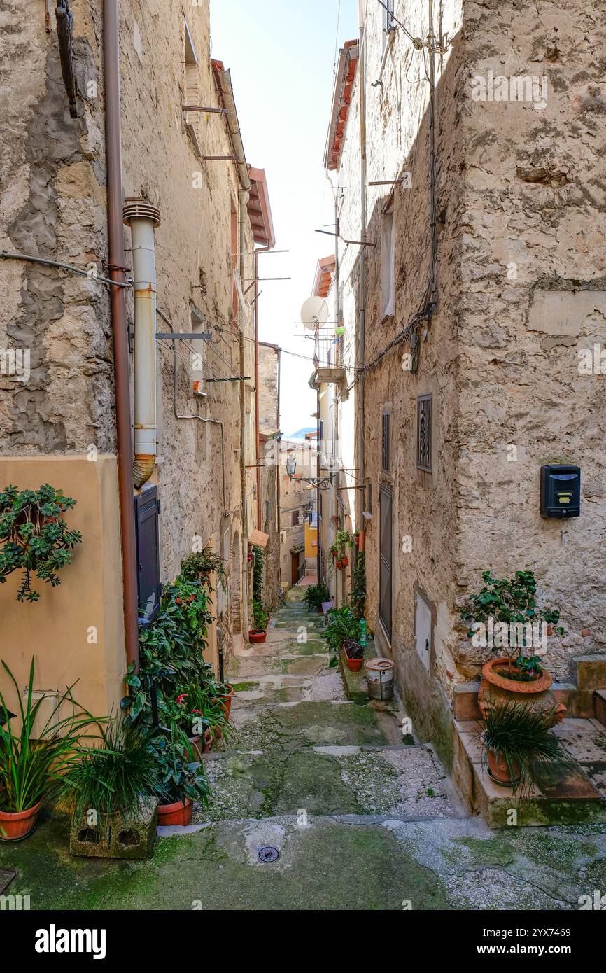 An alley among the stone houses of Maranola, a small medieval town in ...