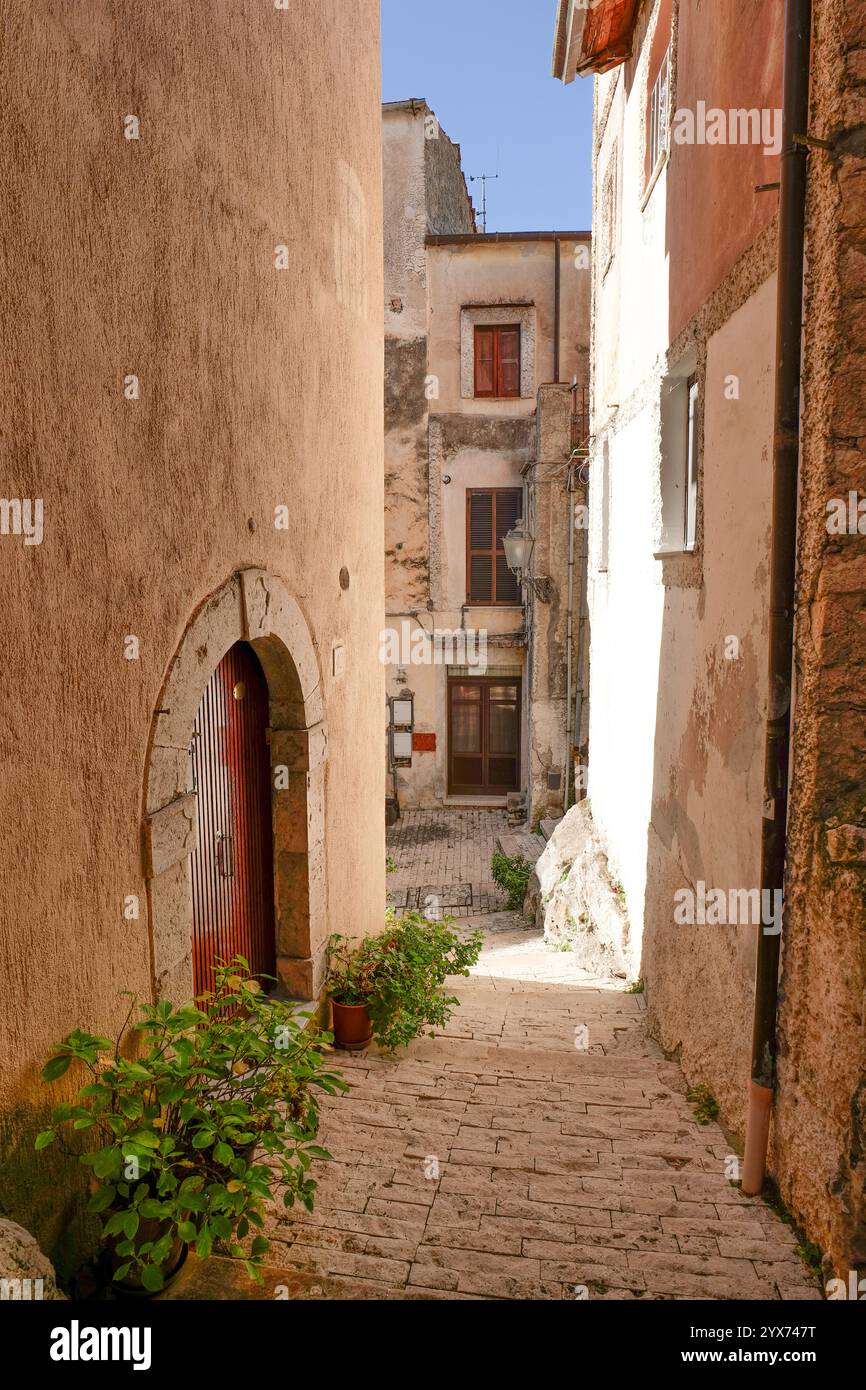 An alley among the stone houses of Maranola, a small medieval town in ...