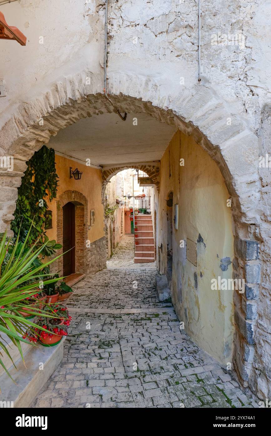 An alley among the stone houses of Maranola, a small medieval town in ...