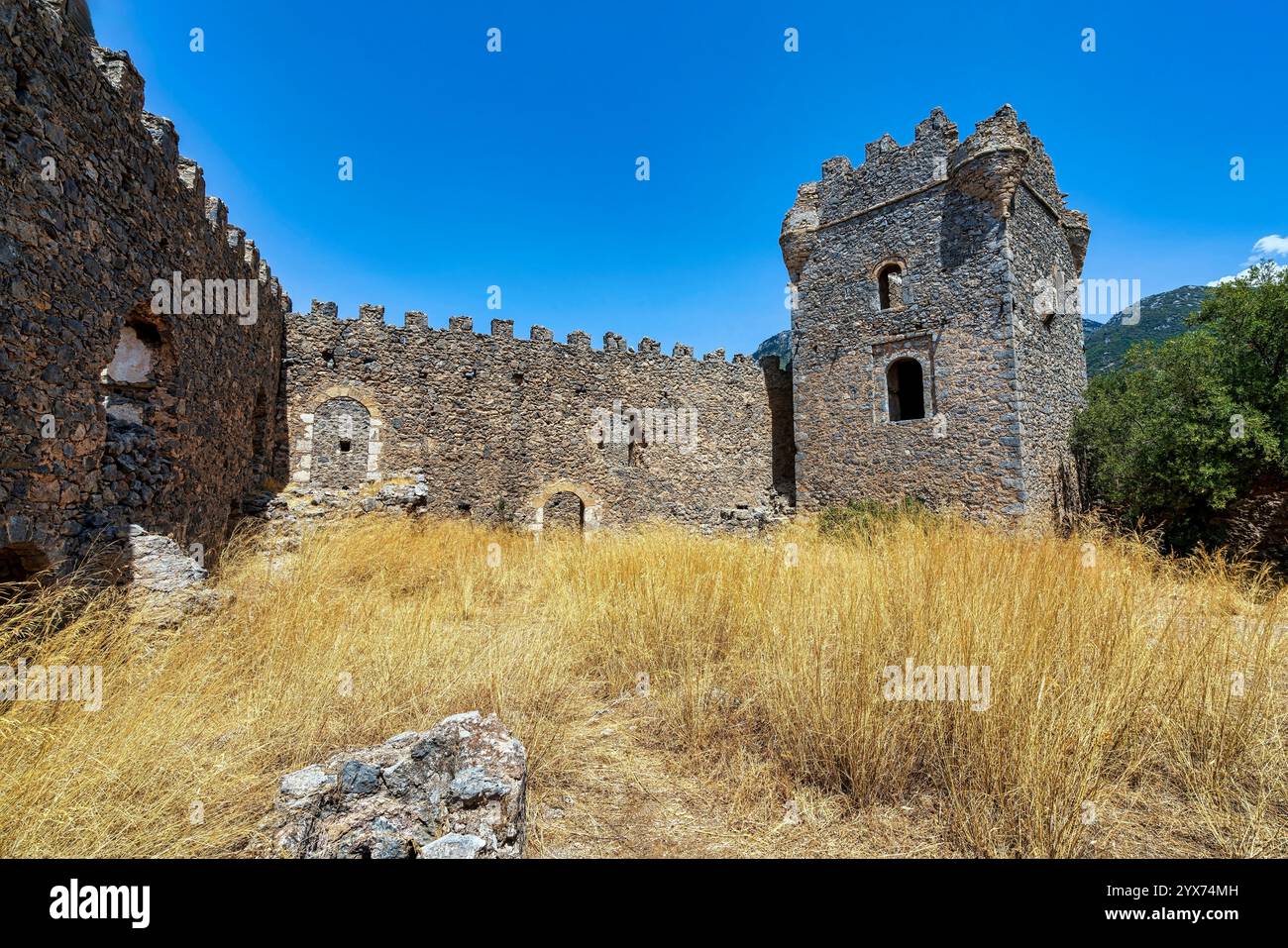 Stone tower of Kapetanakis in Messinia, Greece, showcasing traditional ...
