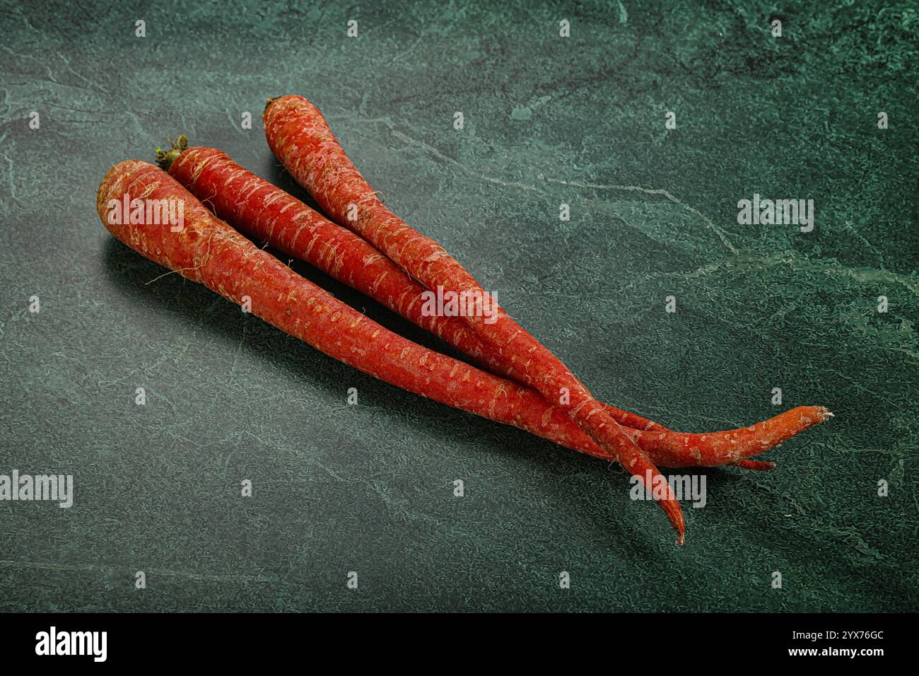 Raw ripe Indian red carrot root Stock Photo - Alamy