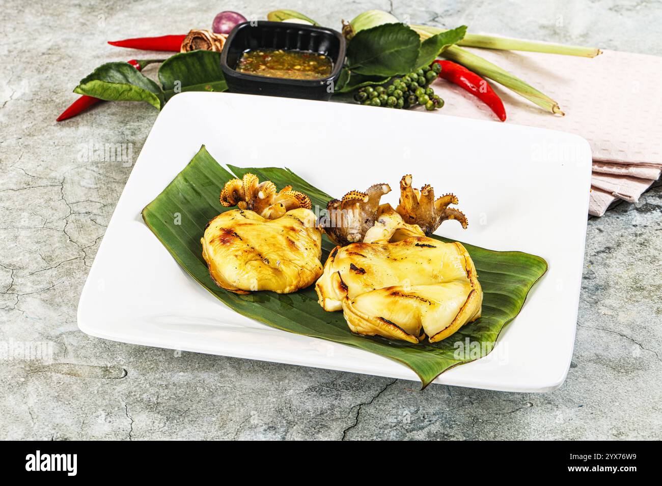 Delicous Grilled cuttlefish with sauce asian style Stock Photo - Alamy