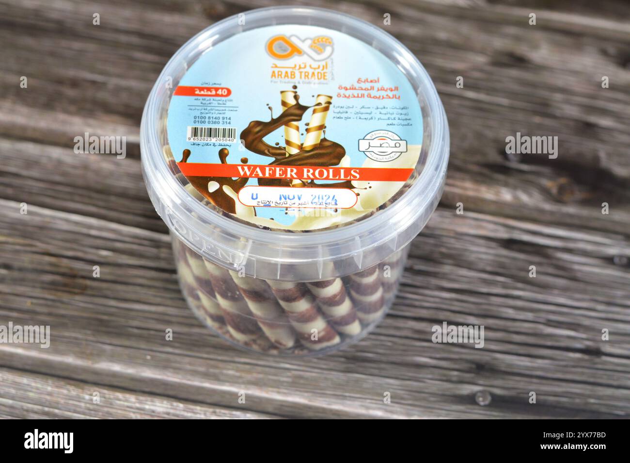 Cairo, Egypt, November 18 2024: Arab trade wafer rolls filled with a ...