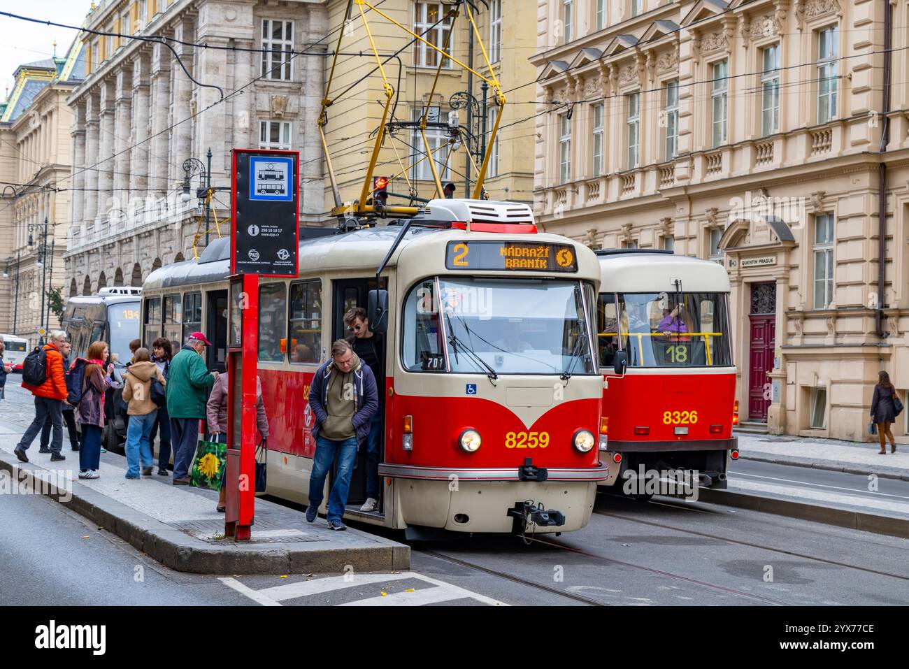 Public transport trams numbered 2 and 18 at a Prague tram stop for ...