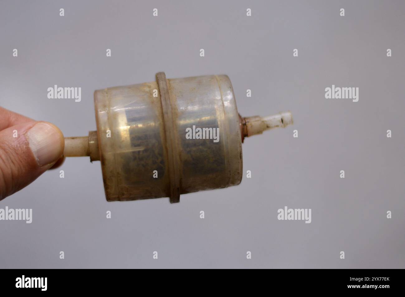 Old broken fuel filter for a car, a filter used to screen out foreign ...