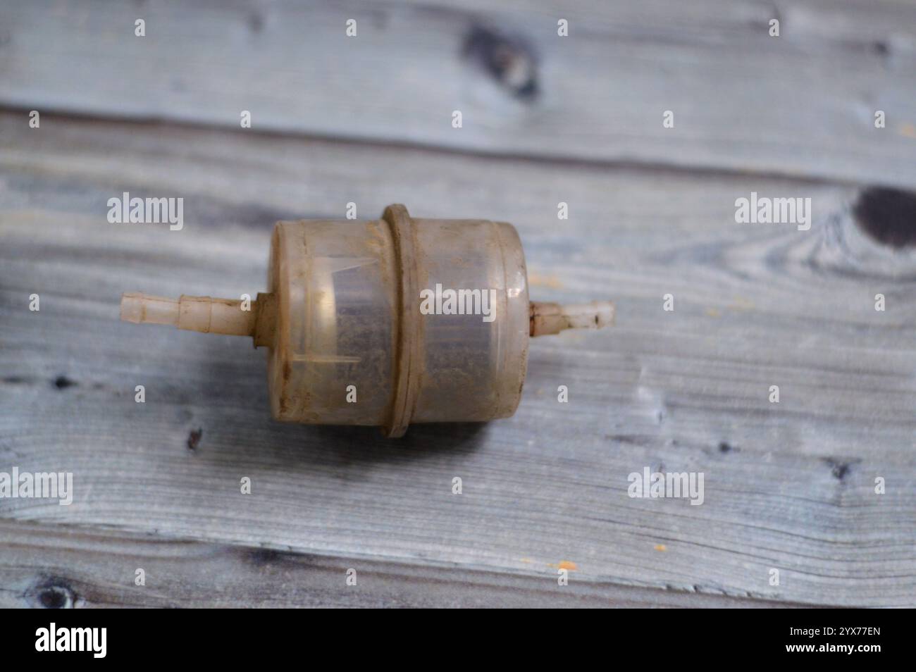 Old broken fuel filter for a car, a filter used to screen out foreign ...