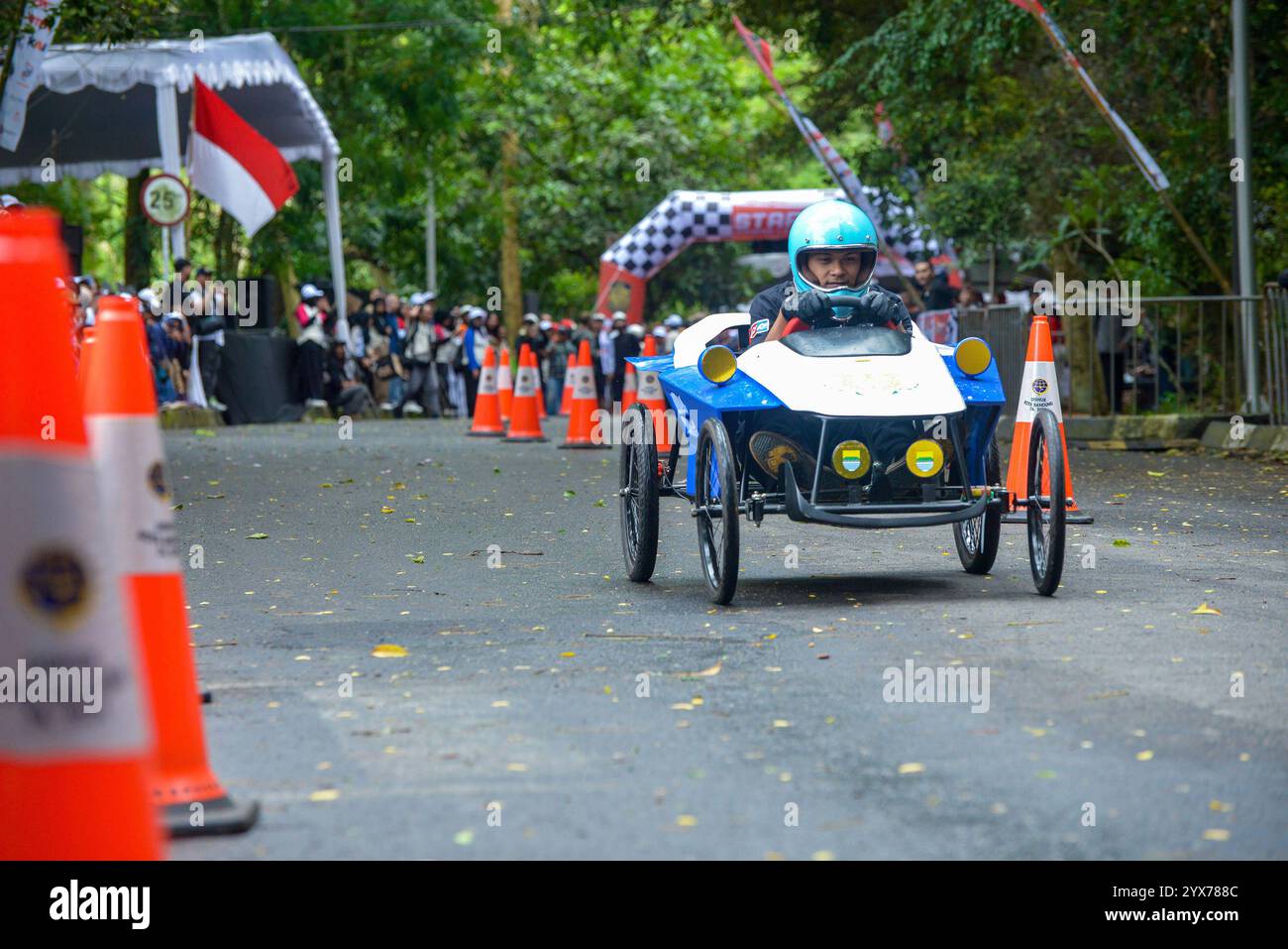 SOAPBOX CART RACE Participants take part in a soapbox car race on a ...